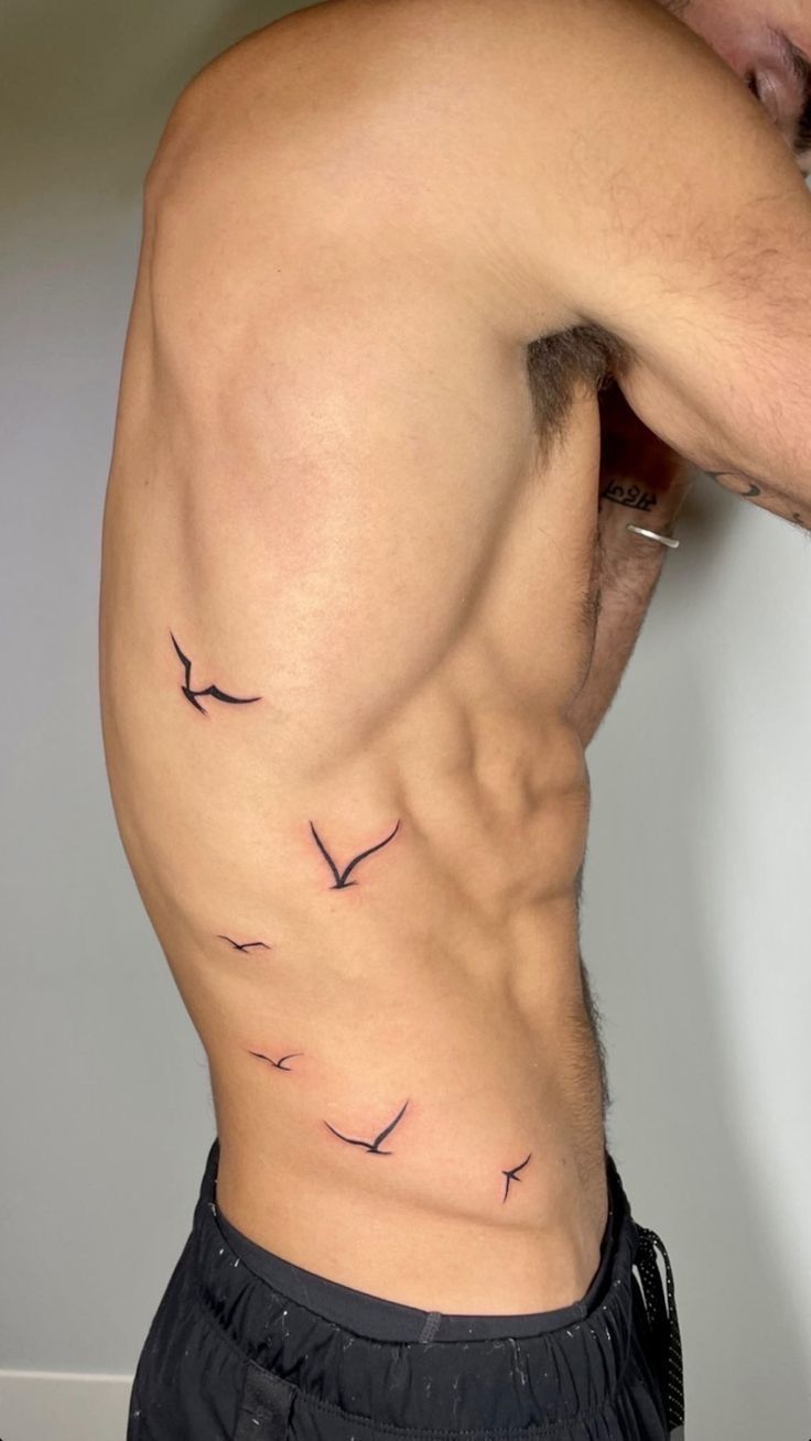 Small Rib Tattoo Ideas for Guys - Riccda